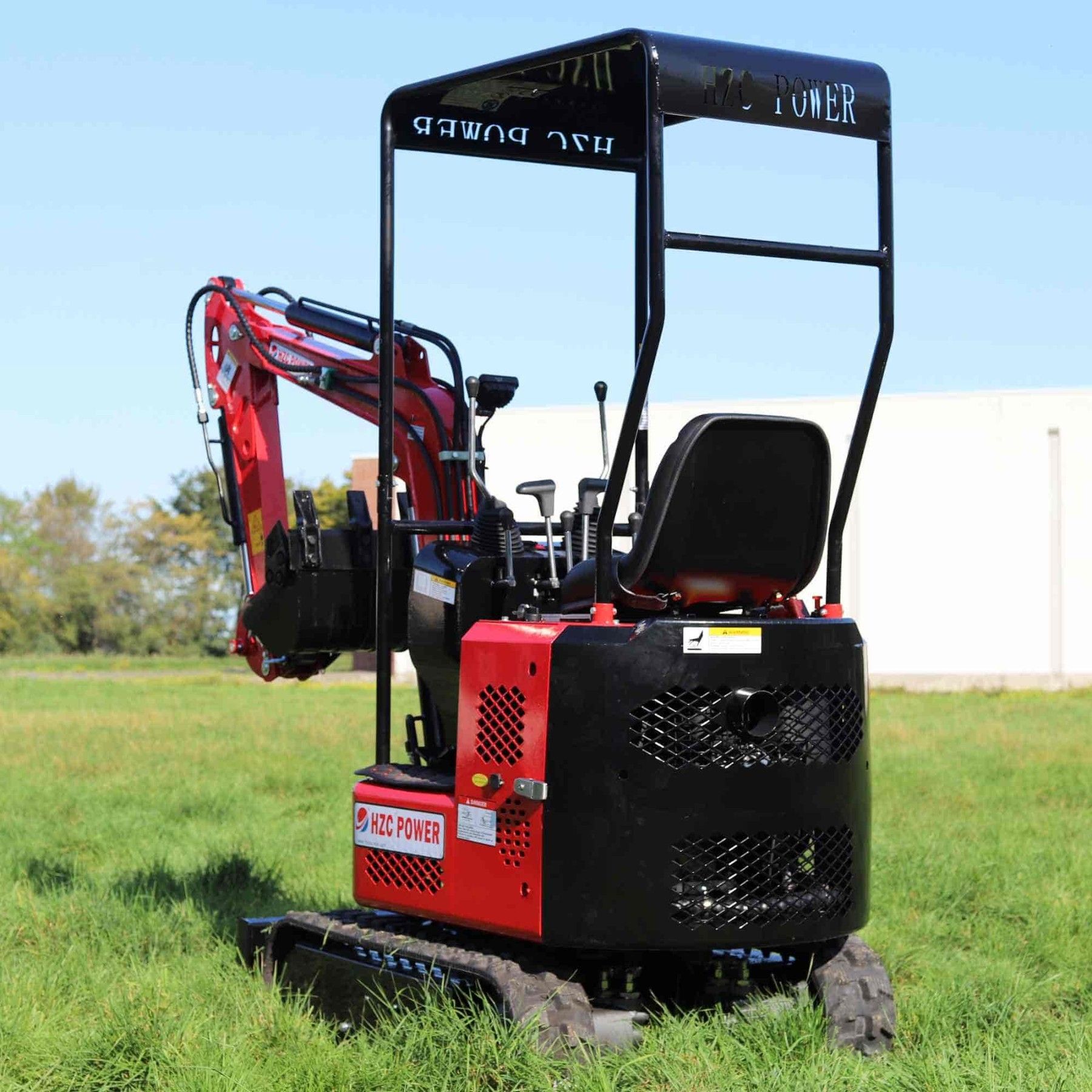 Minibagger mit Benzinmotor, verstellbarem Fahrwerk & schwenkbarem Arm ...